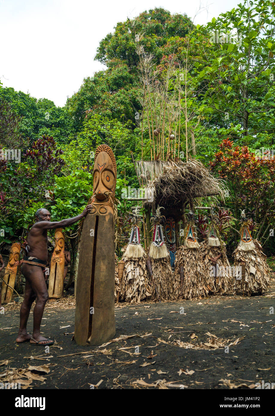 Rom dance masks and giant slit drum during a ceremony, Ambrym island ...