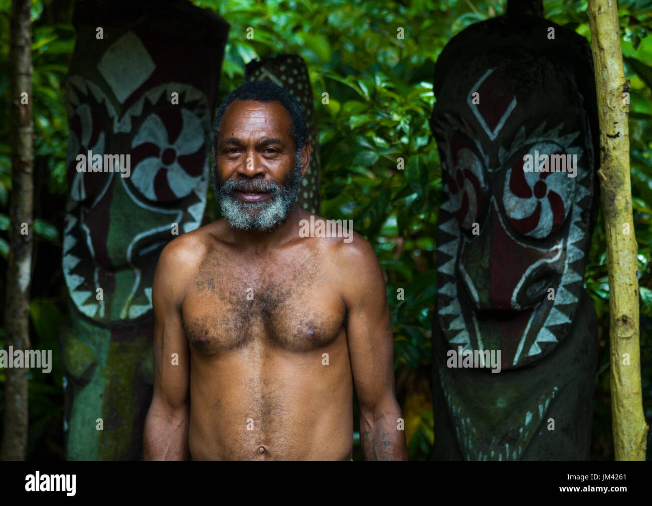 Portrait of a leader in front of slit drums, Ambrym island, Olal ...