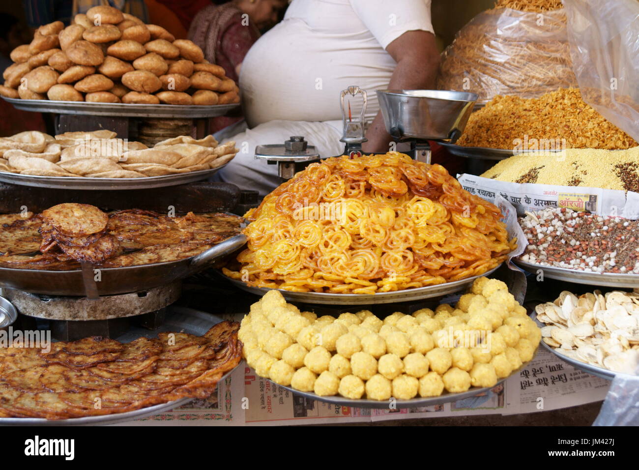 Piles of Indian sweets on display at a shop in Pushkar, Rajasthan ...