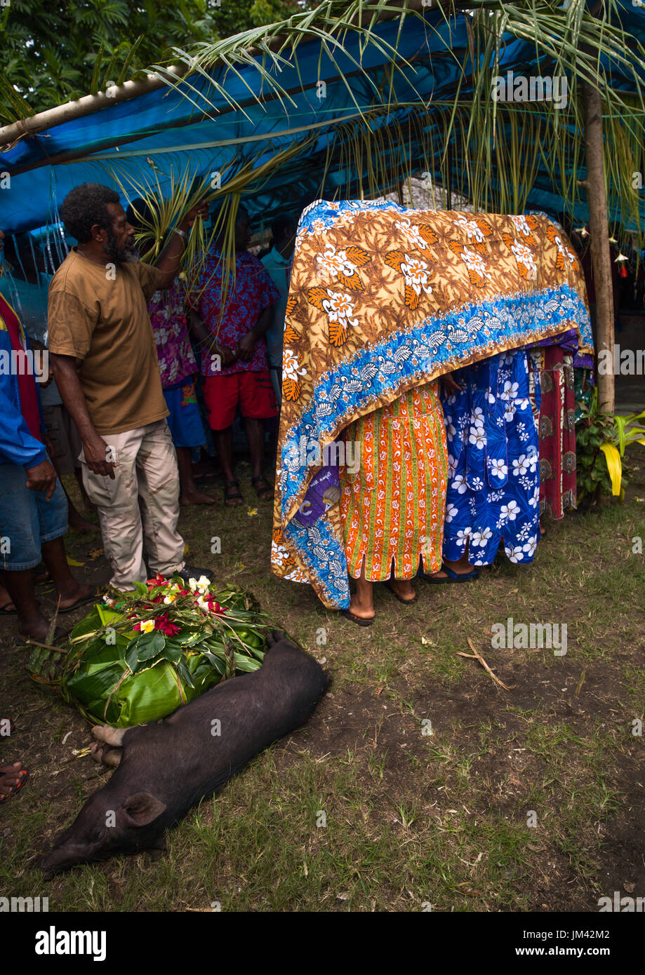 People queueing to meet the bride and the groom during a traditional ...