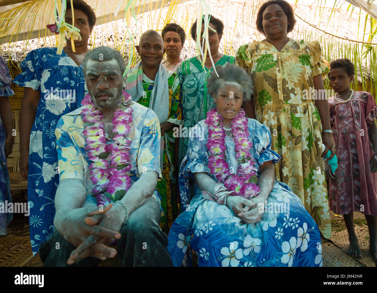 Couple covered in flour during a traditional wedding, Malampa Province ...