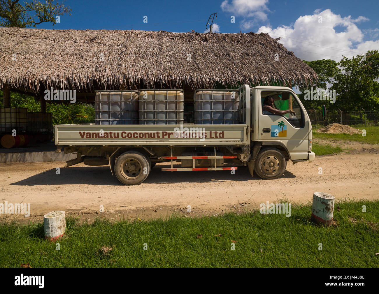 Truck carrying coconut oil barrels produced as an alternative fuel ...