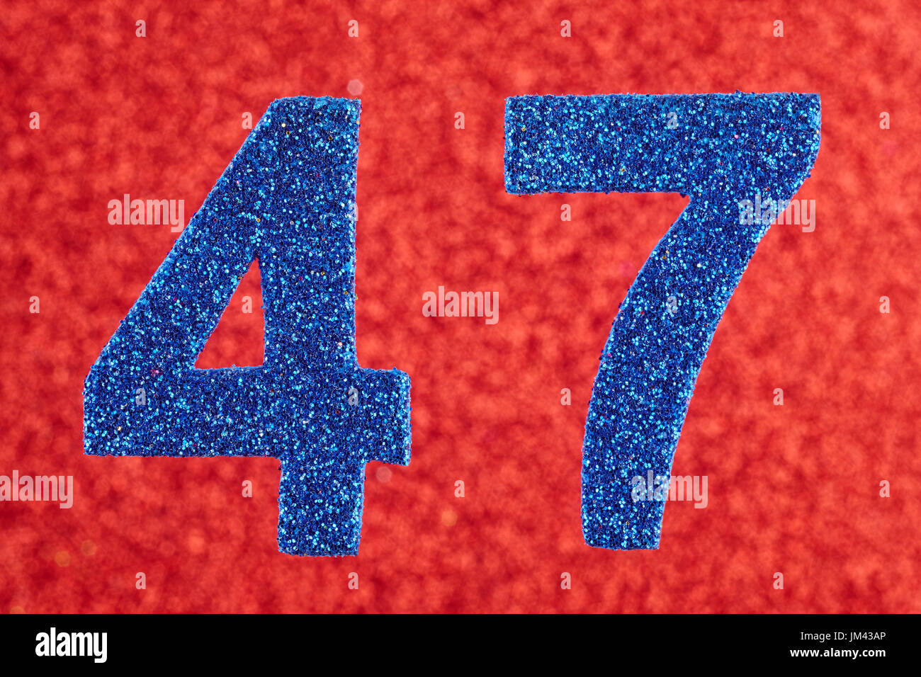 Number forty-seven blue color over a red background. Anniversary ...