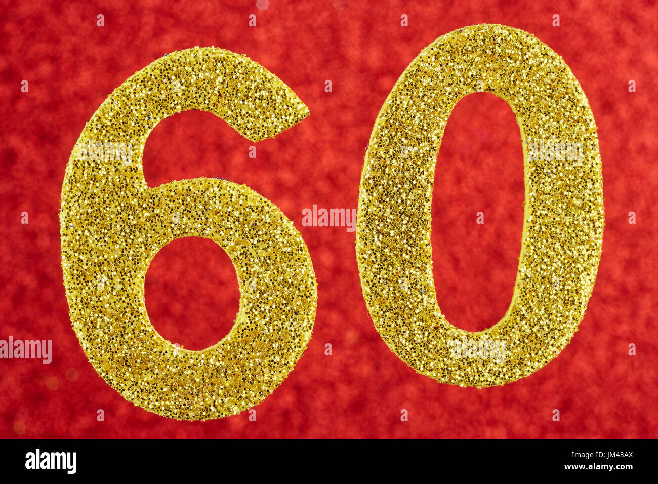 Number sixty yellow color over a red background. Anniversary ...