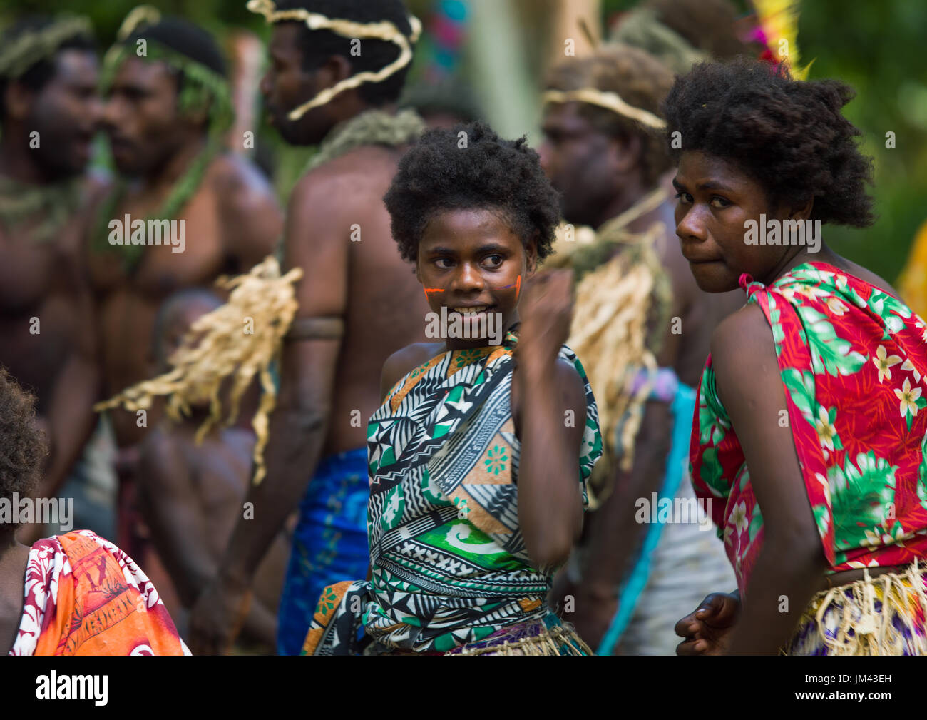 Traditional dance with girls in colorful clothes, Tanna island, Epai ...