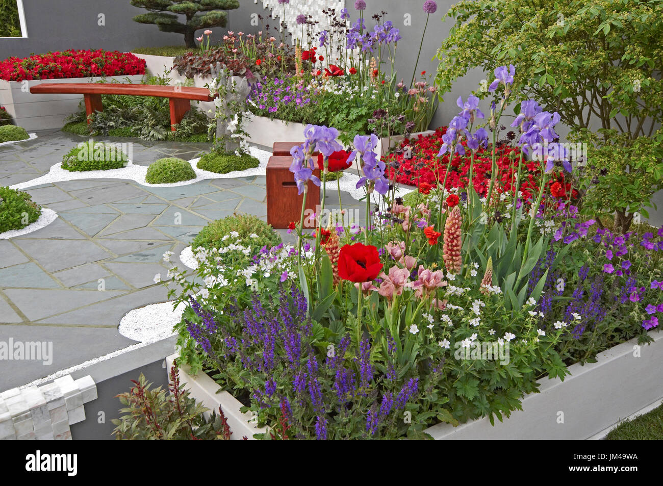 A modern peaceful rooftop space in an urban garden created in the ...