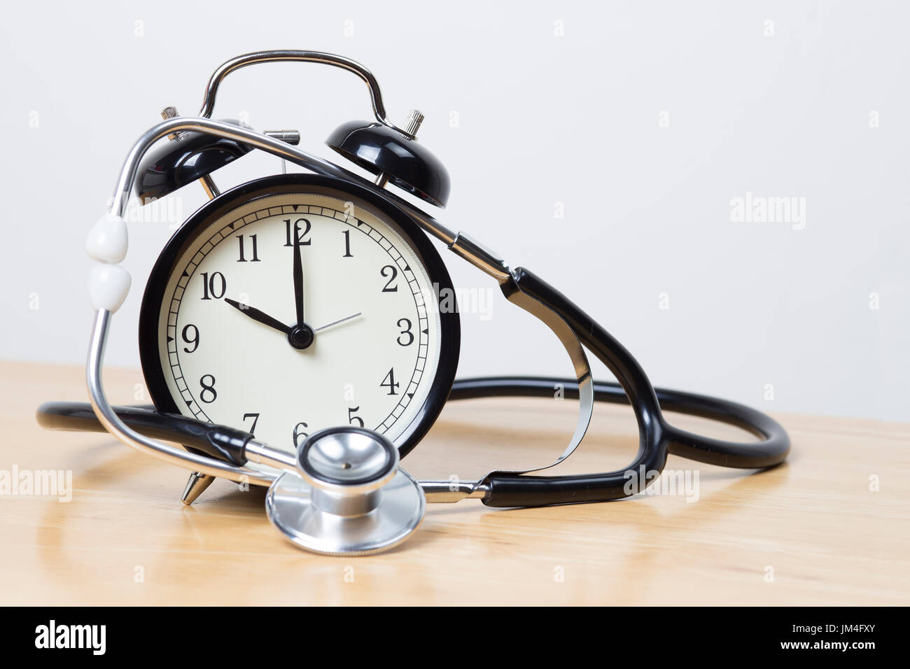 Alarm clock showing time for the next appointment Stock Photo - Alamy
