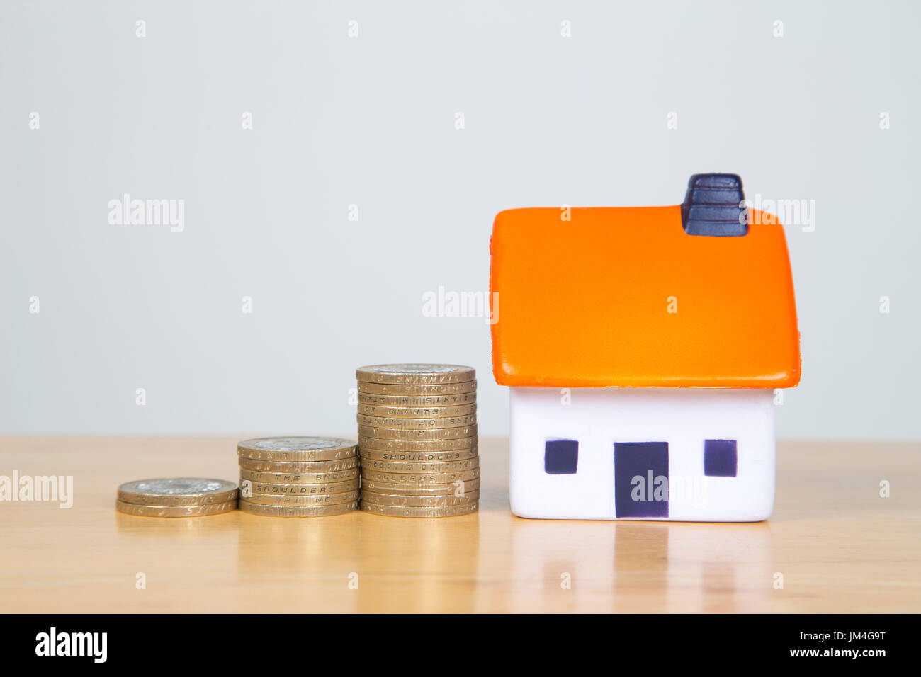 Conceptual image showing the increase of property prices Stock Photo ...