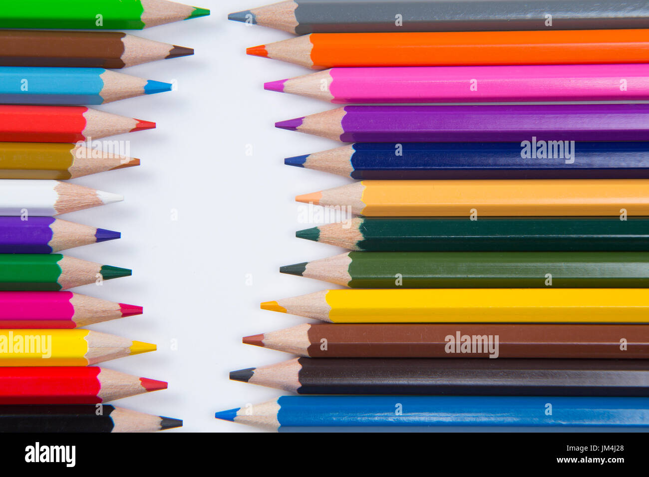 Pencils arranged on white paper Stock Photo - Alamy