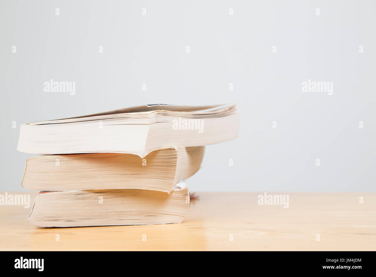 Paper back books in a pile Stock Photo - Alamy