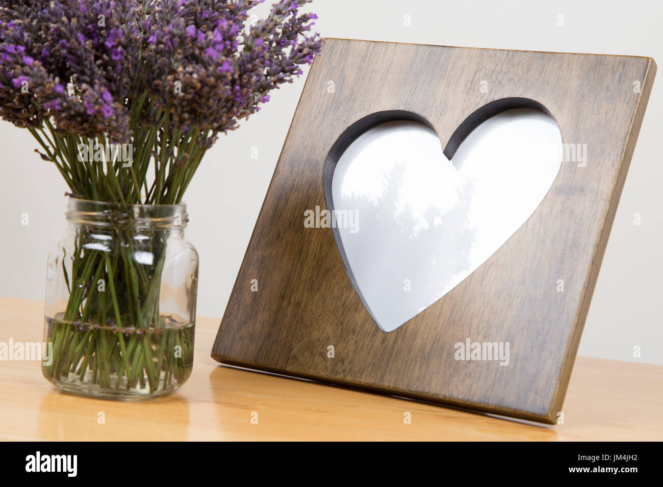 Heart picture frame with Lavender plant on the side Stock Photo - Alamy