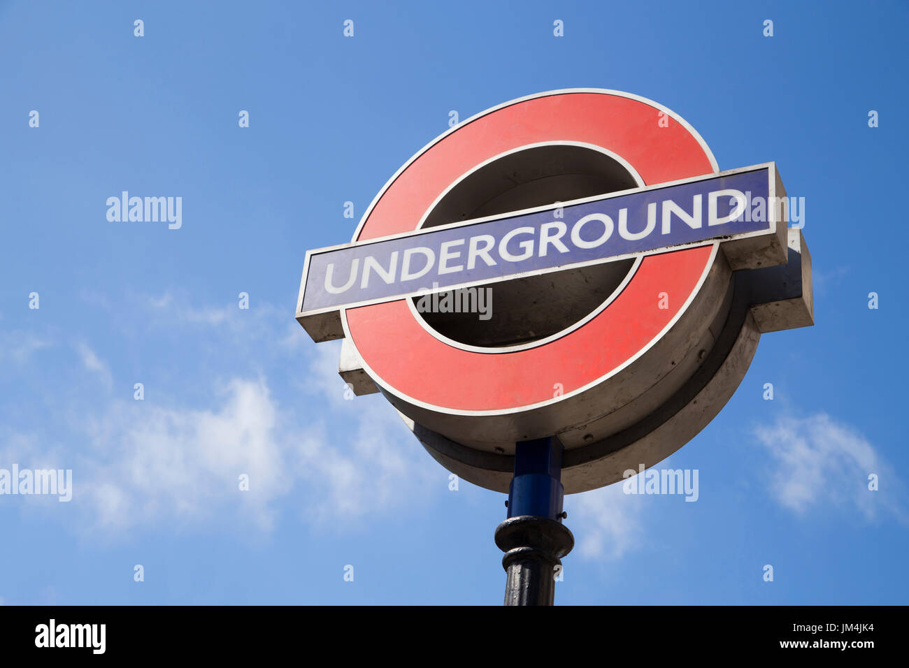 Underground sign against blue sky Stock Photo - Alamy