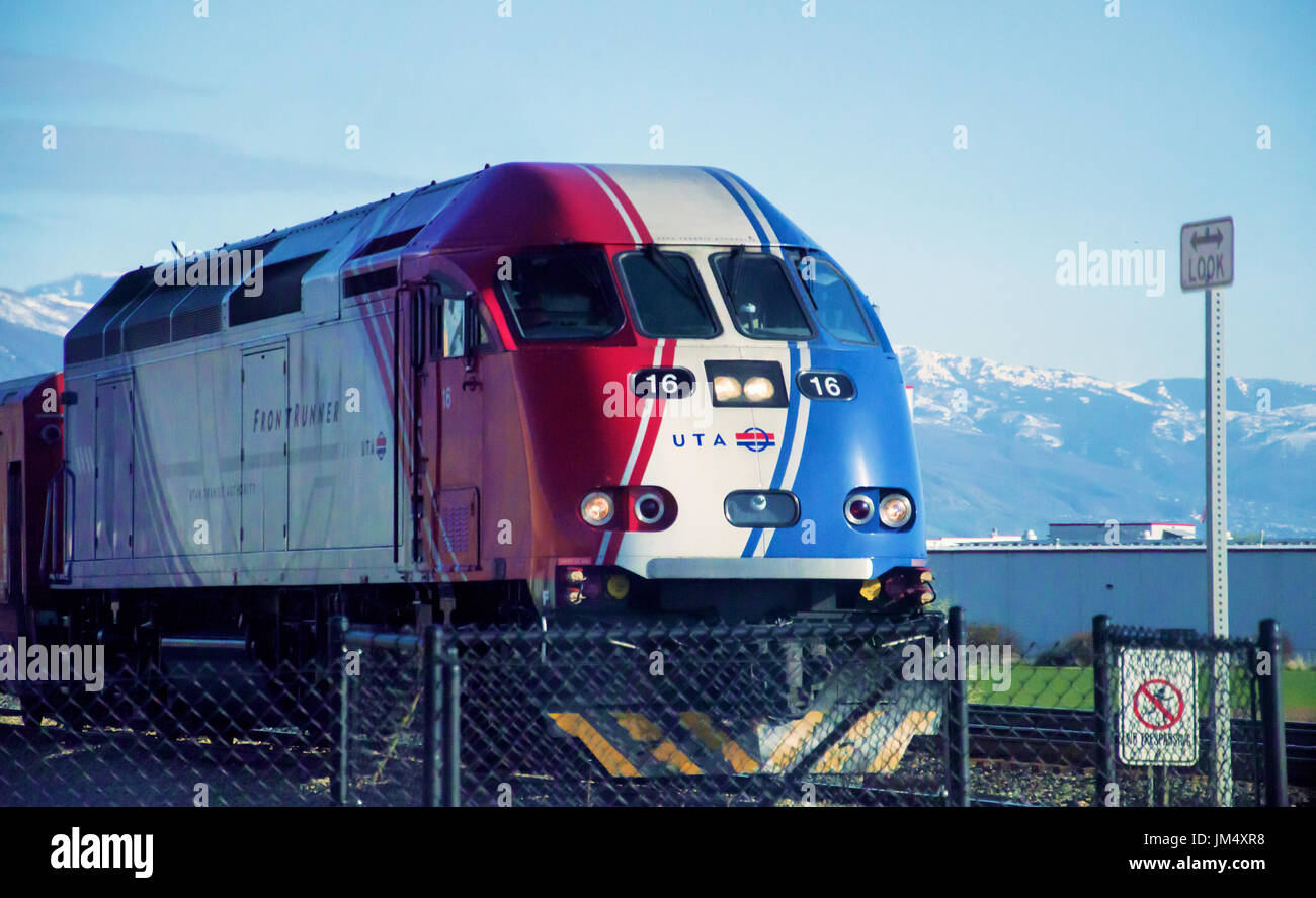 A Utah transit passenger train at a railroad crossing Stock Photo - Alamy