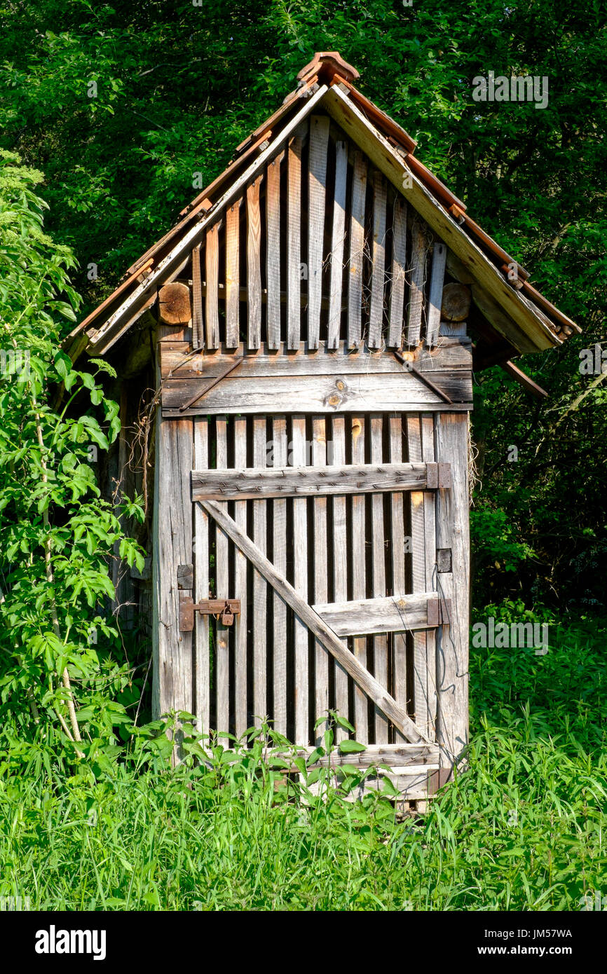 crop drying shed outbuilding in the garden of a typical rural village ...