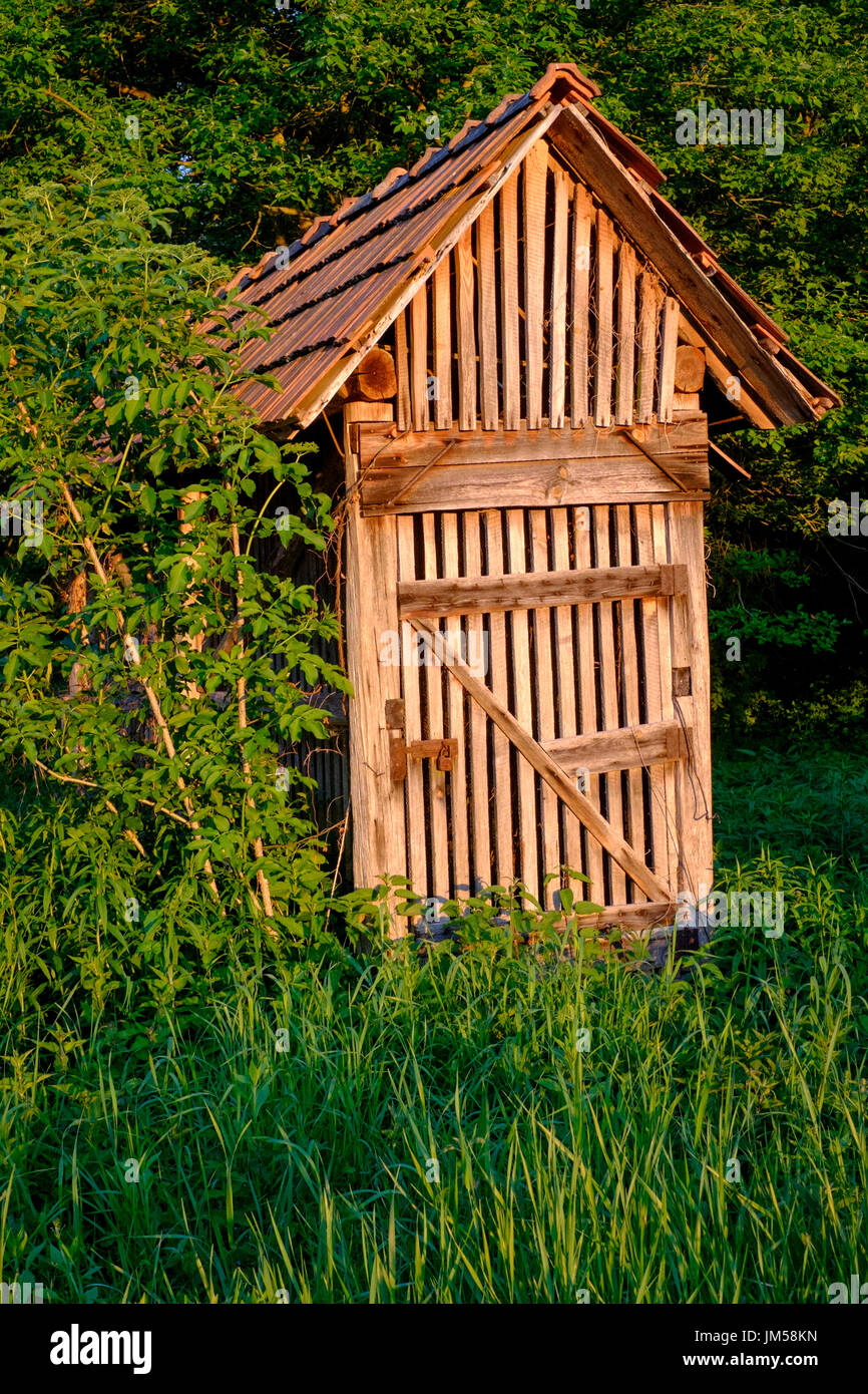 crop drying shed outbuilding in the garden of a typical rural village ...