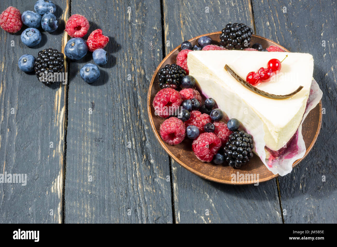 Dessert menu. Cheesecake with wild berries. Sweet snack Stock Photo - Alamy
