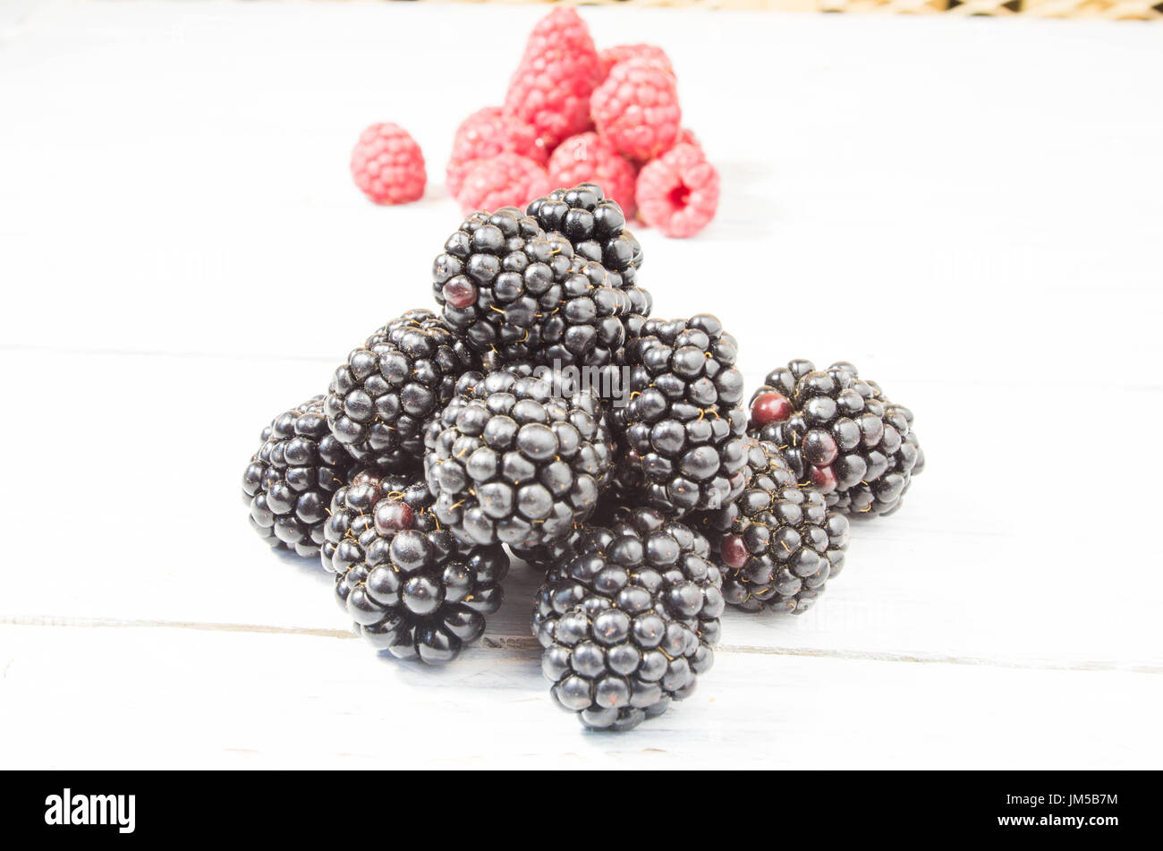 Blackberry and red raspberry. Berries on a white background Stock Photo ...