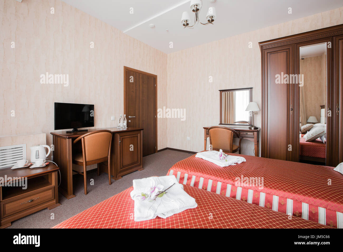 Hotel apartment, bedroom interior in the morning Stock Photo - Alamy