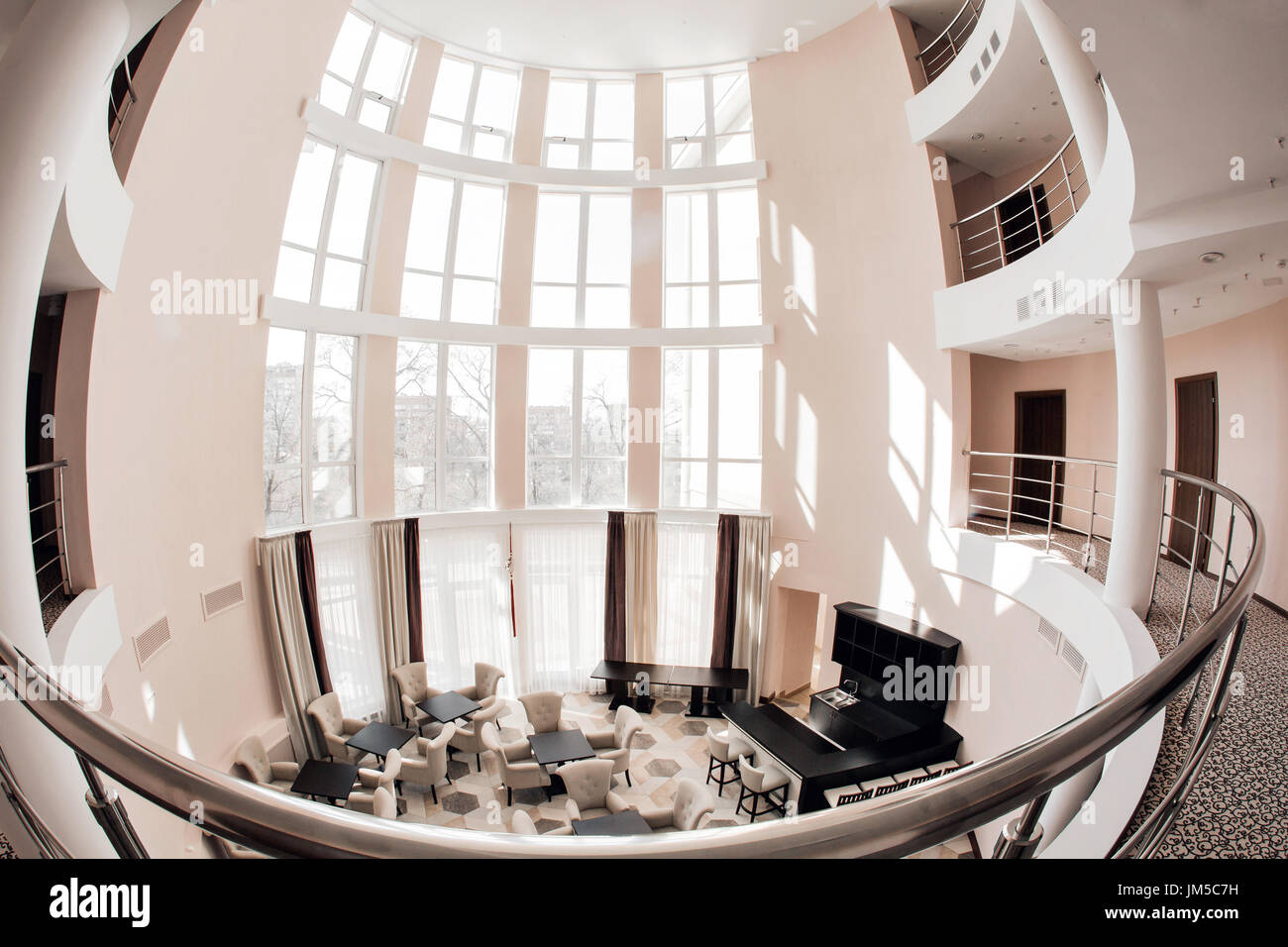 Modern luxury hotel lobby interior. high ceiling Stock Photo - Alamy