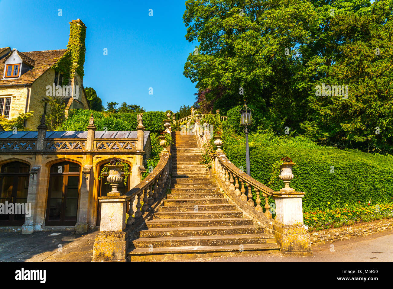 Beautiful stone stairs leading up to the garden, old decorative ...