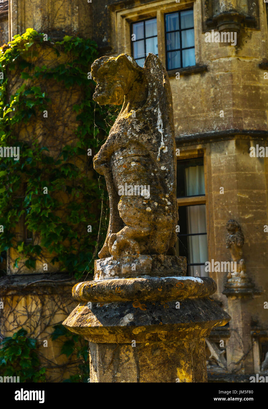 Old sculpture on the pedestal, beautifully preserved old artistic ...