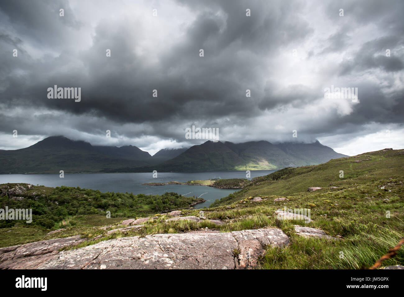 Picturesque view of Upper Loch Torridon with the cloudy topped Beinn ...