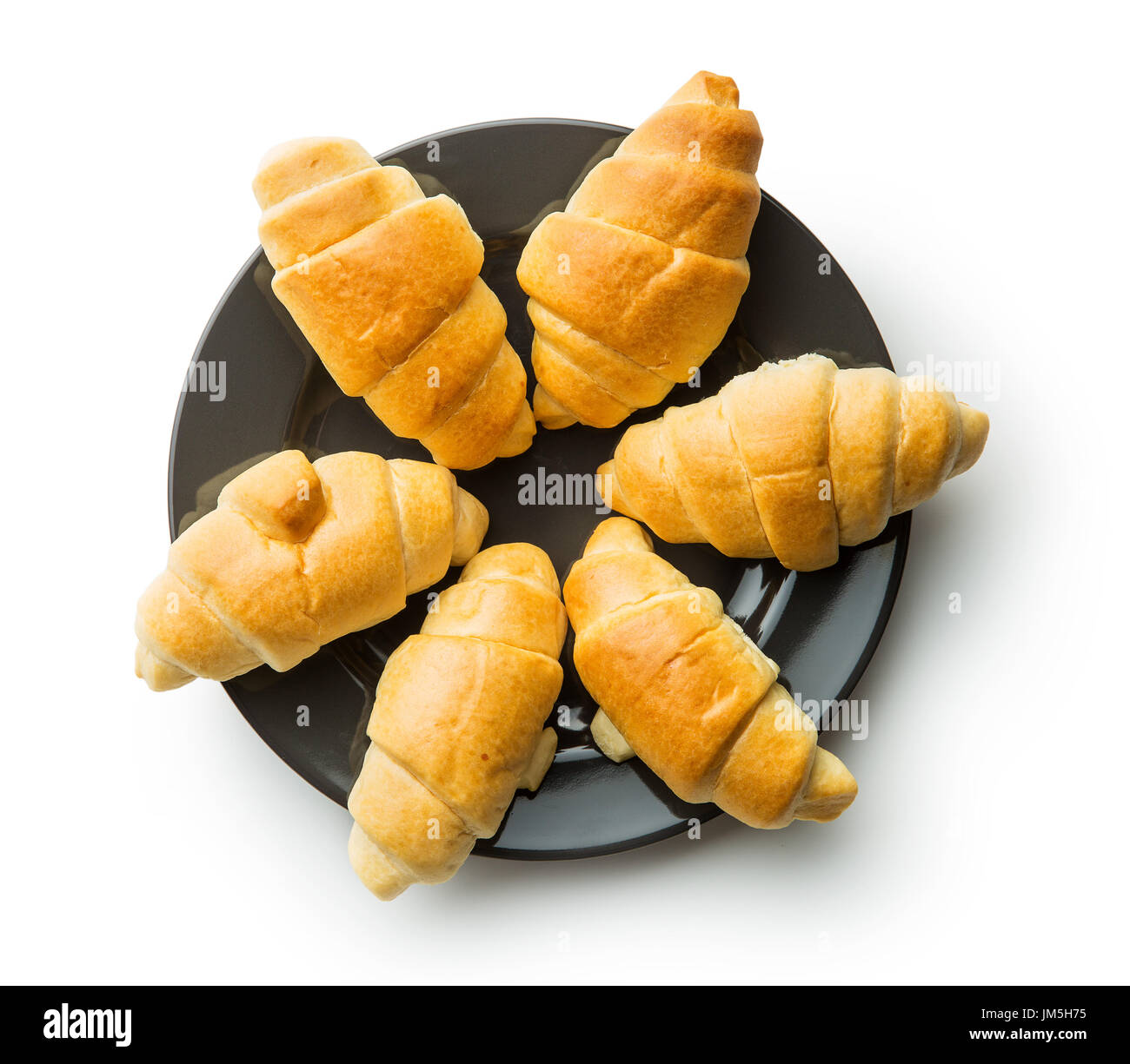 Tasty buttery croissants on plate isolated on white background Stock ...
