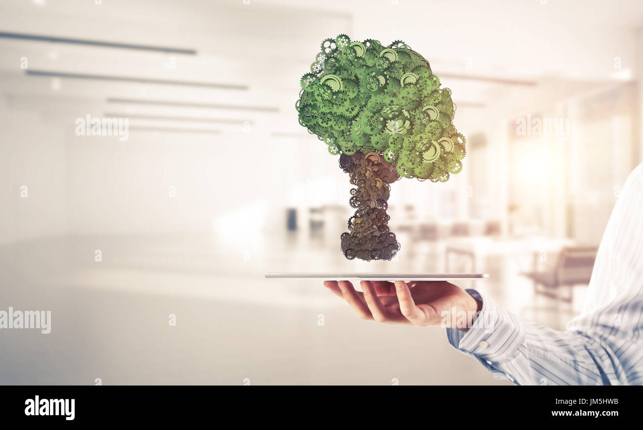 Eco green environment concept presented by tree as working mecha Stock ...