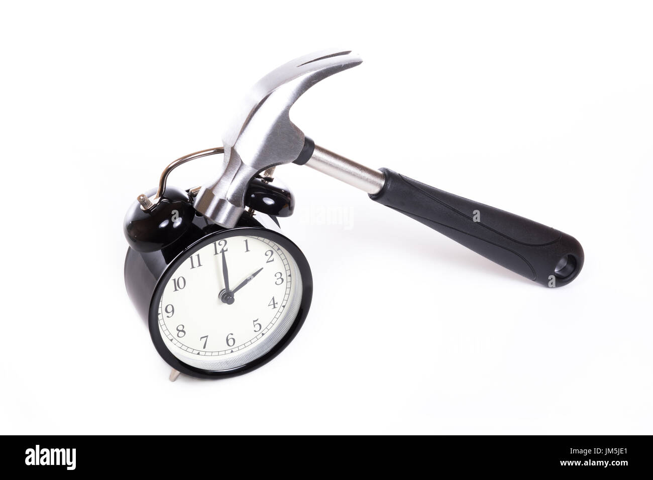 Black classic alarm clock hit by hammer tool, isolated on white ...