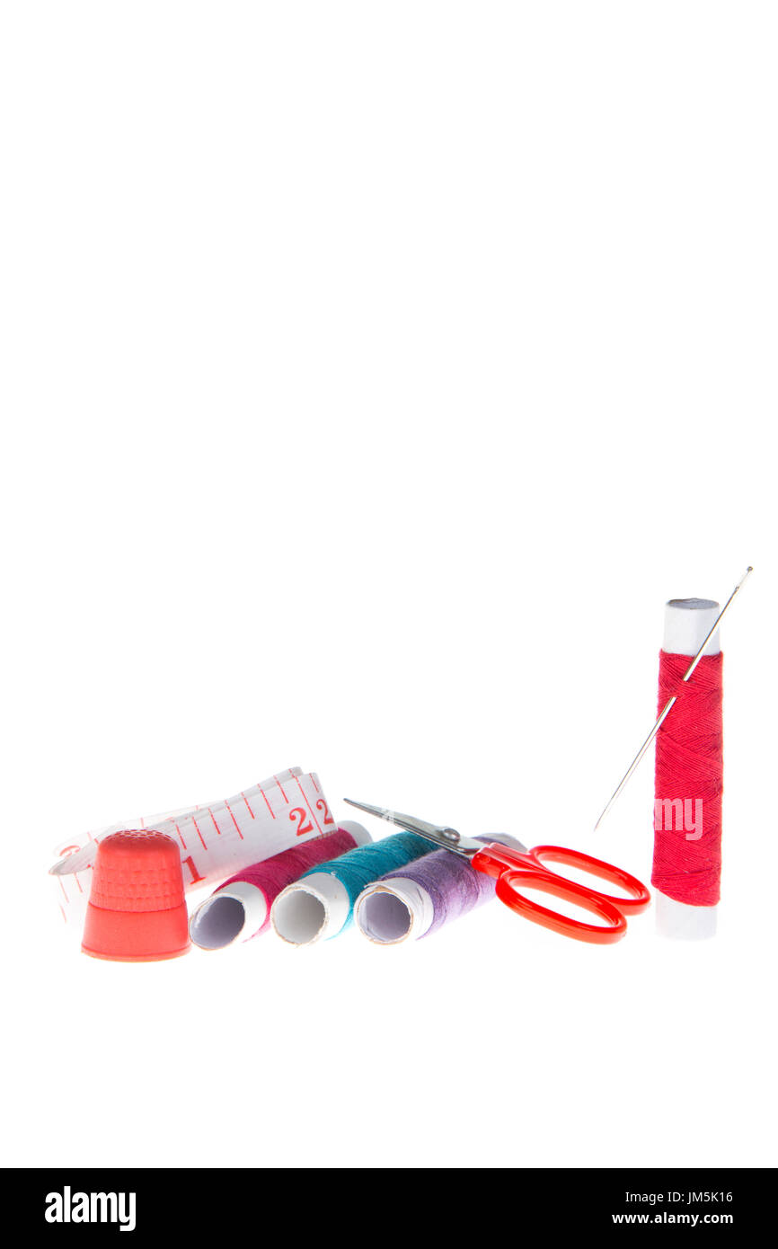 Needle and thread sewing kit background on a white background Stock ...