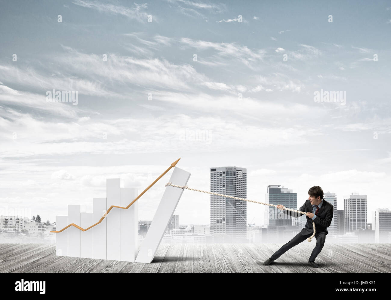 Man pulling with effort big pulling rope graph, as a symbol of ...