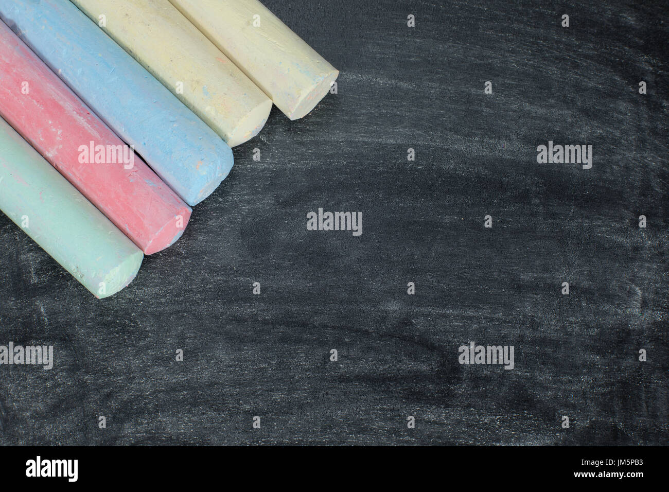 Back to school or primary education concept with new sticks of colored ...