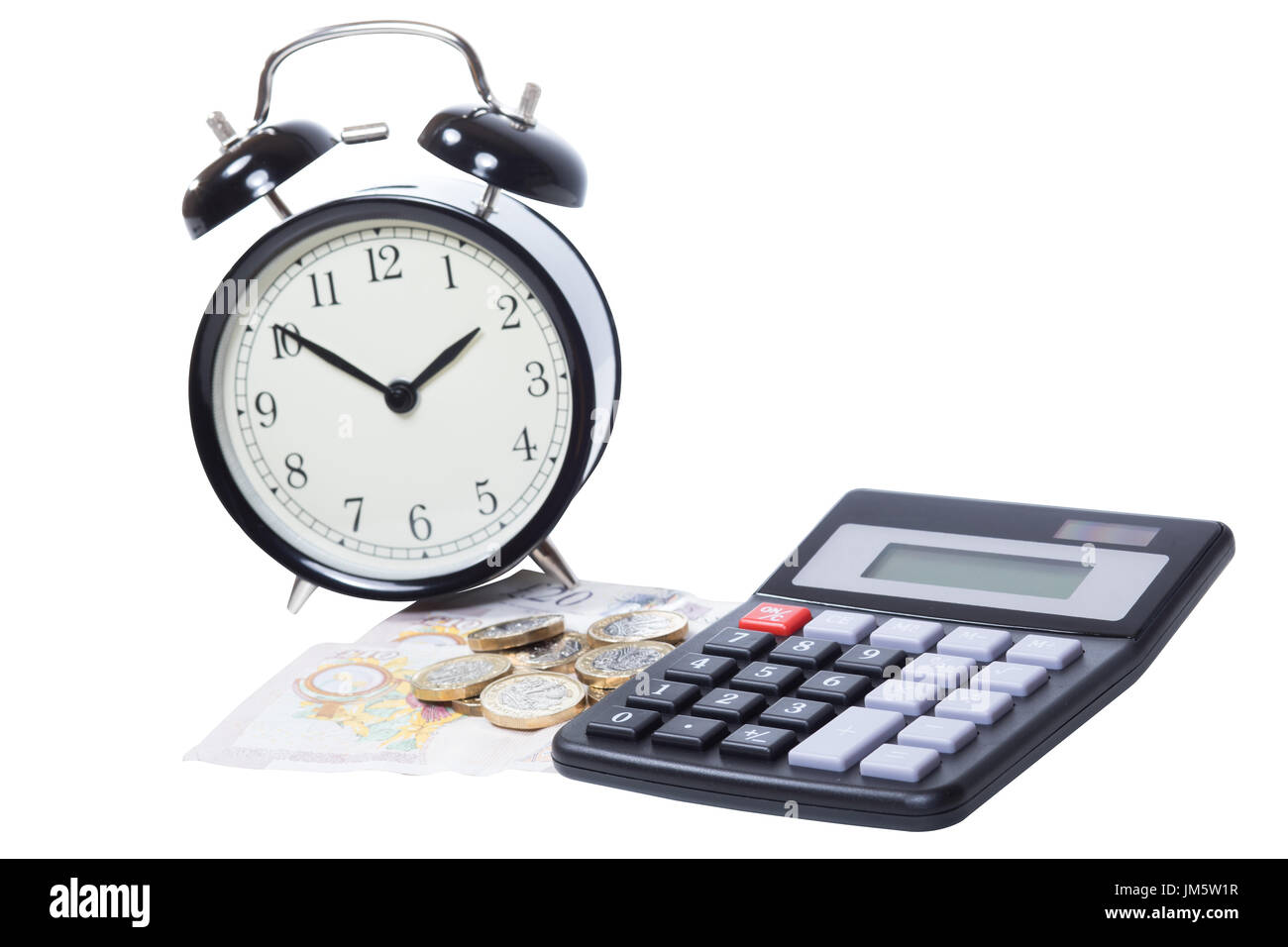 Still life of an alarm clock with a pile of pound banknotes and coins ...
