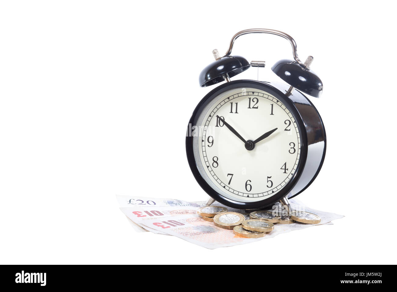 Alarm clock and loose change or money with pound notes and coins ...