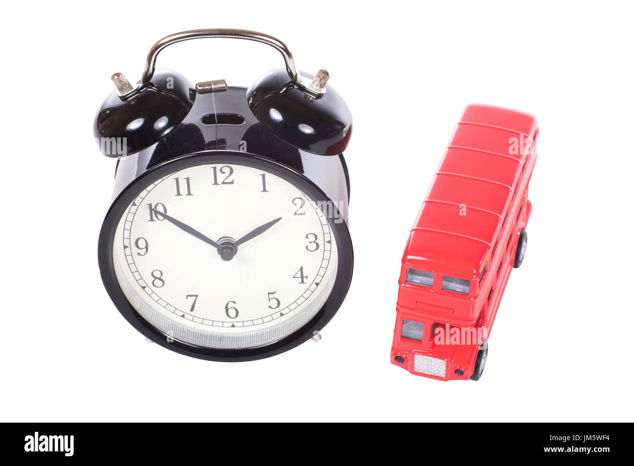 Red London double-decker bus with a retro alarm clock isolated on white ...