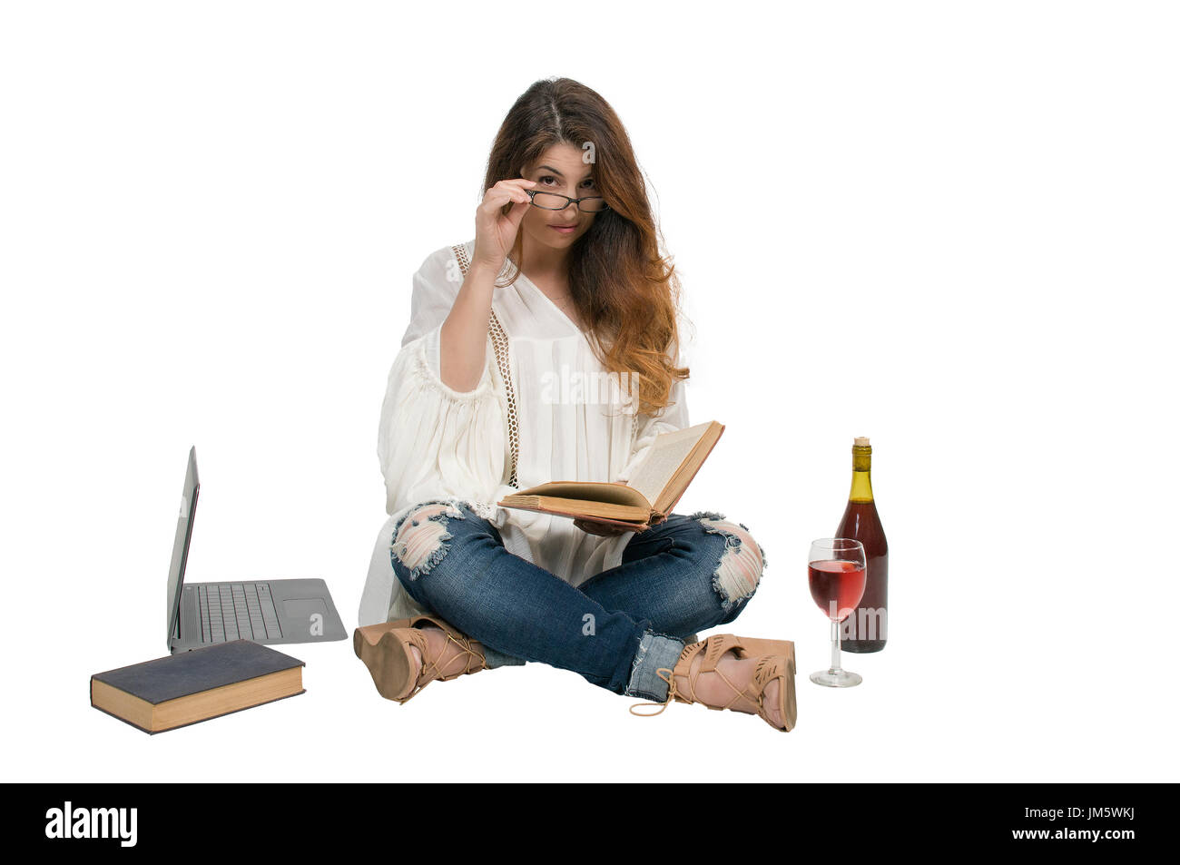 Beautiful young woman reading an interesting book Stock Photo - Alamy