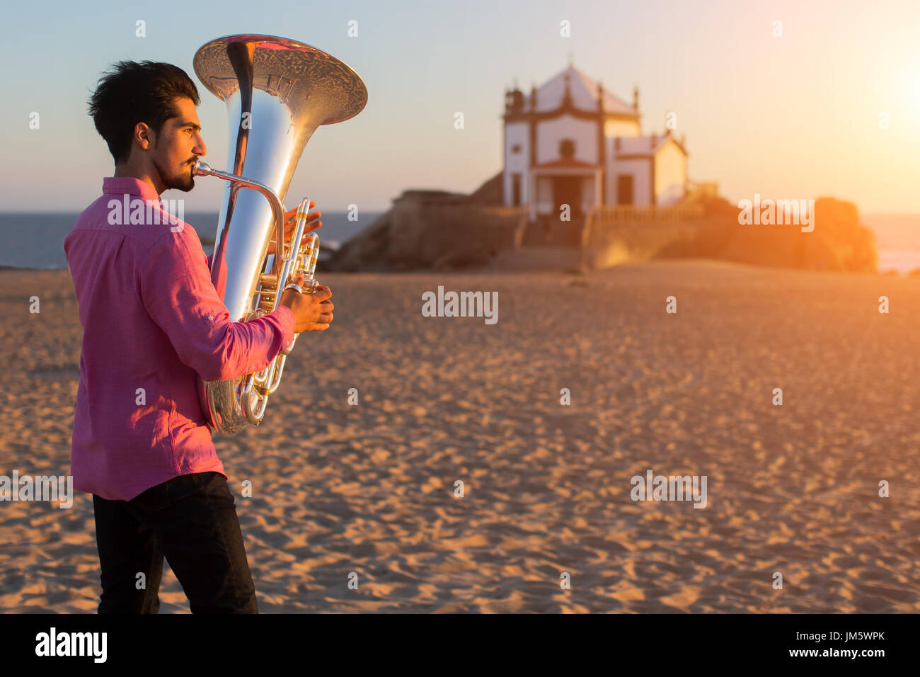 Young man playing tuba hi-res stock photography and images - Alamy