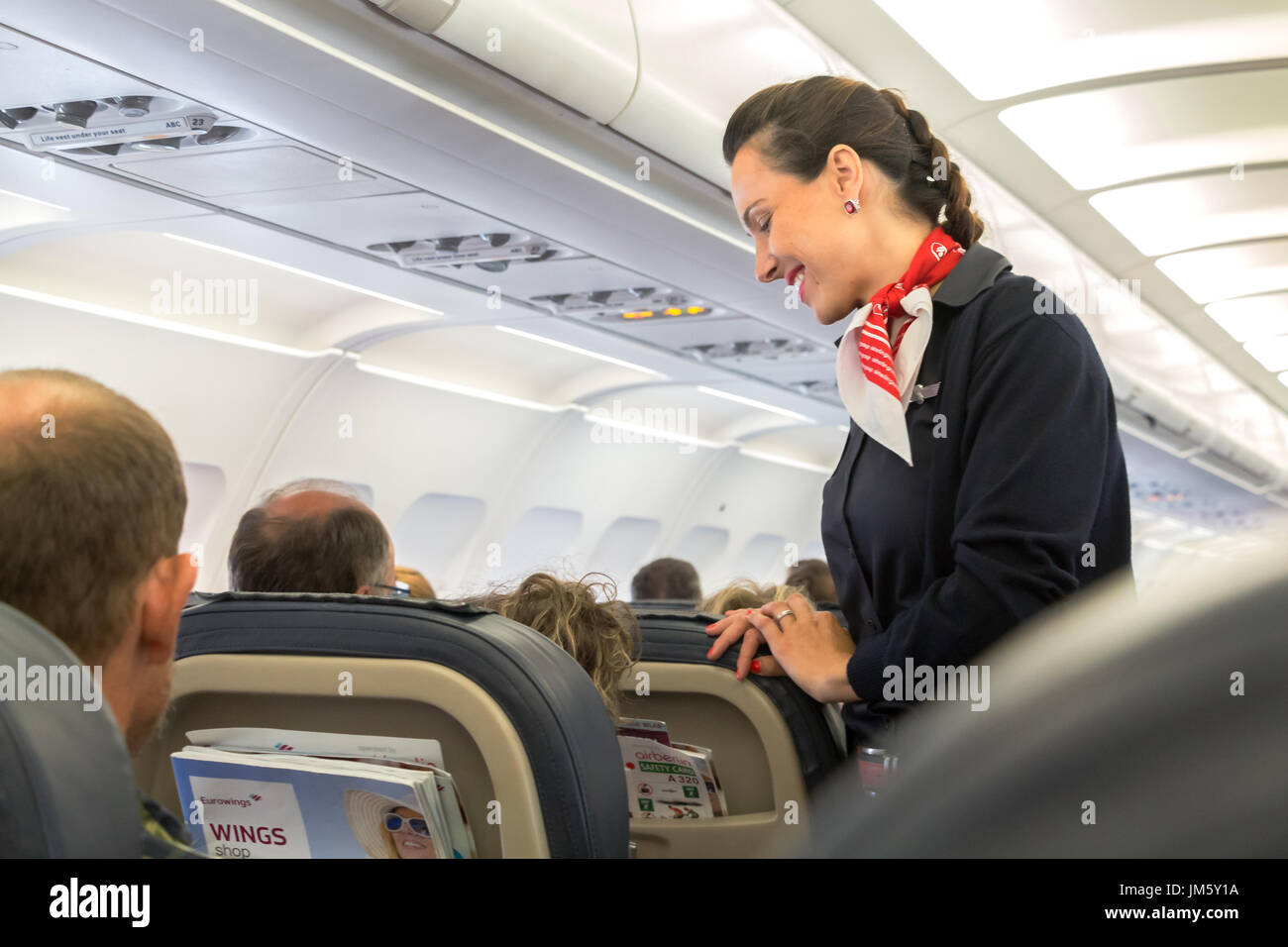 Female flight attendant hi-res stock photography and images - Alamy