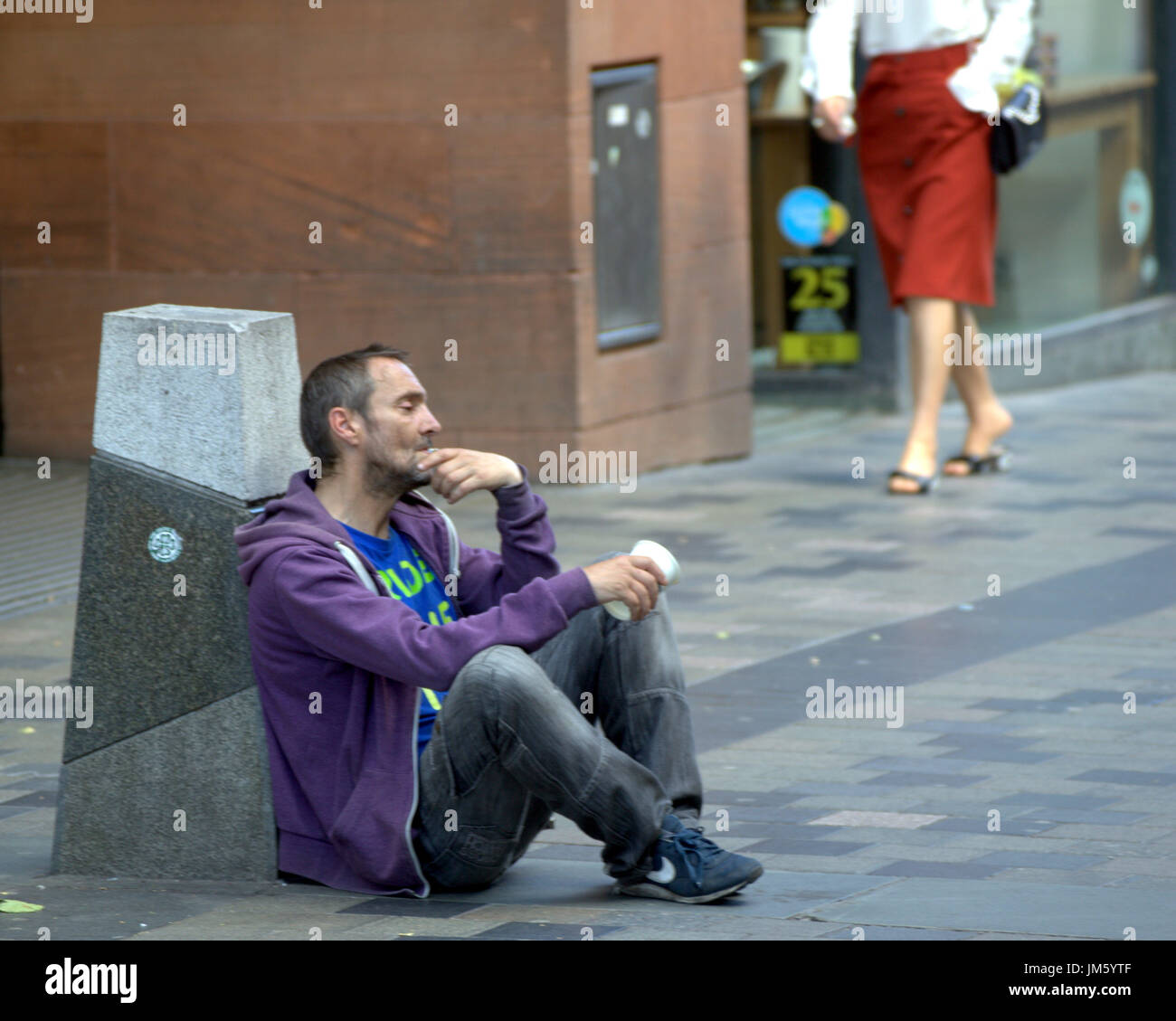 man begging homeless unemployed man begging on the street with cup ...
