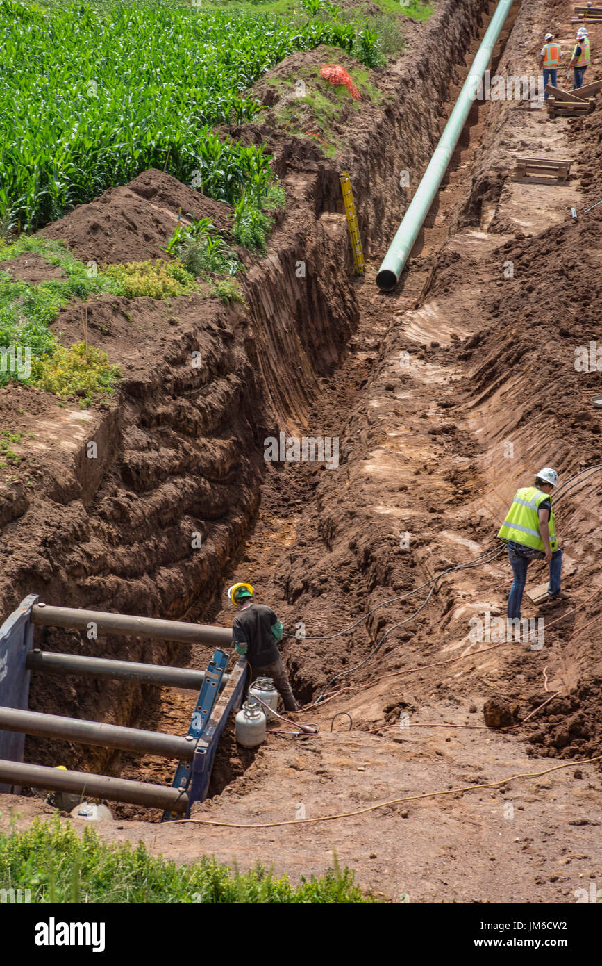 Natural gas pipeline installation in rural PA farm field being ...