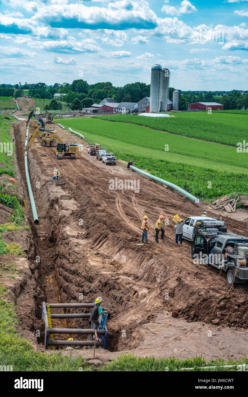 Natural gas pipeline installation in rural PA farm field being ...