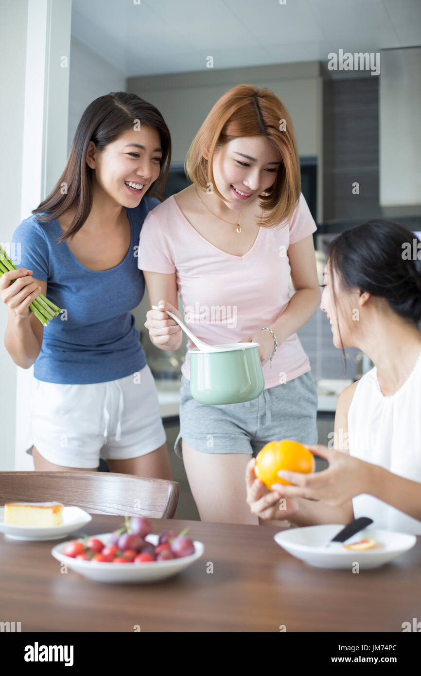 Adult friends eating fruit cake hi-res stock photography and images - Alamy