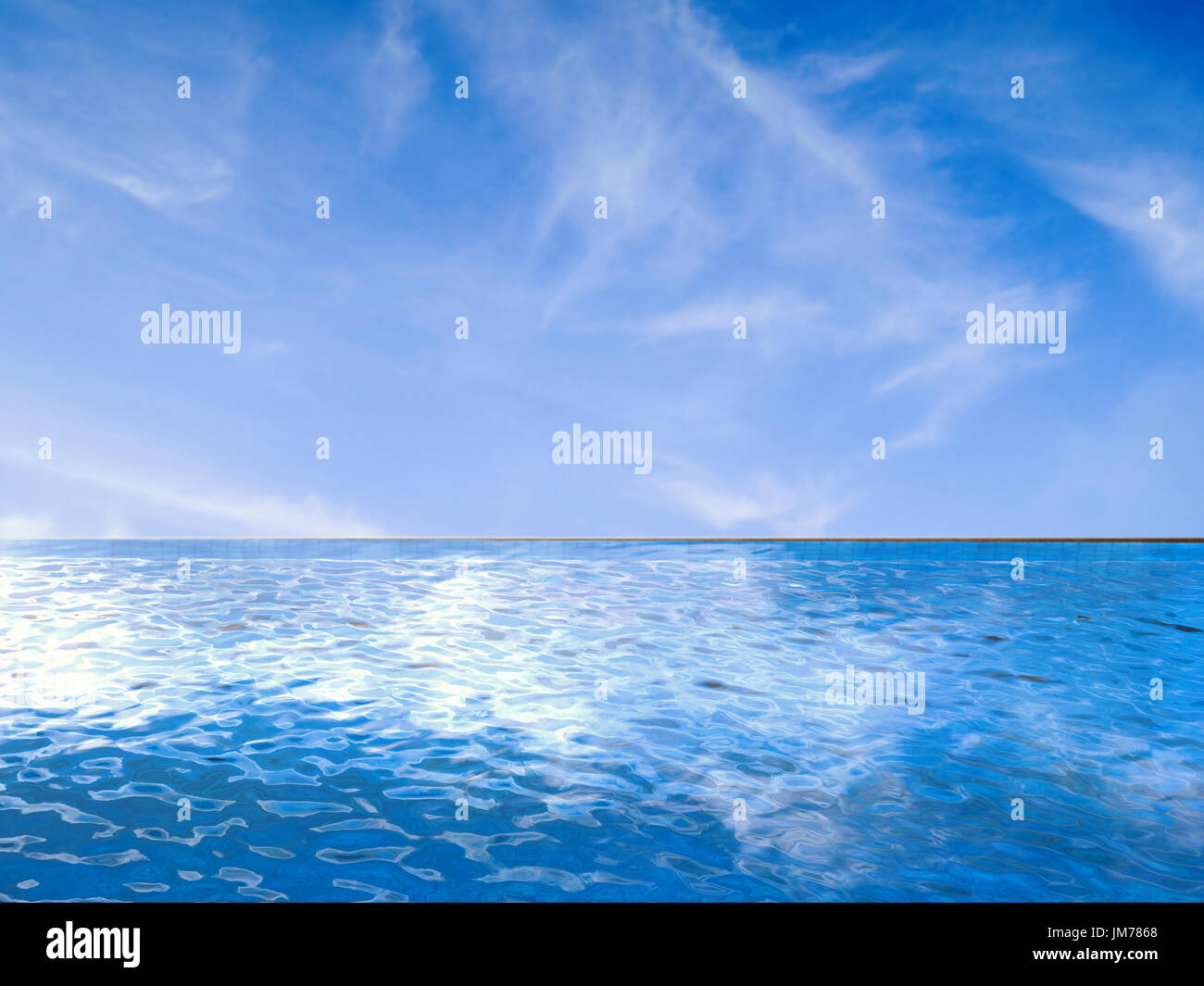 infinity pool with blue sky background Stock Photo - Alamy