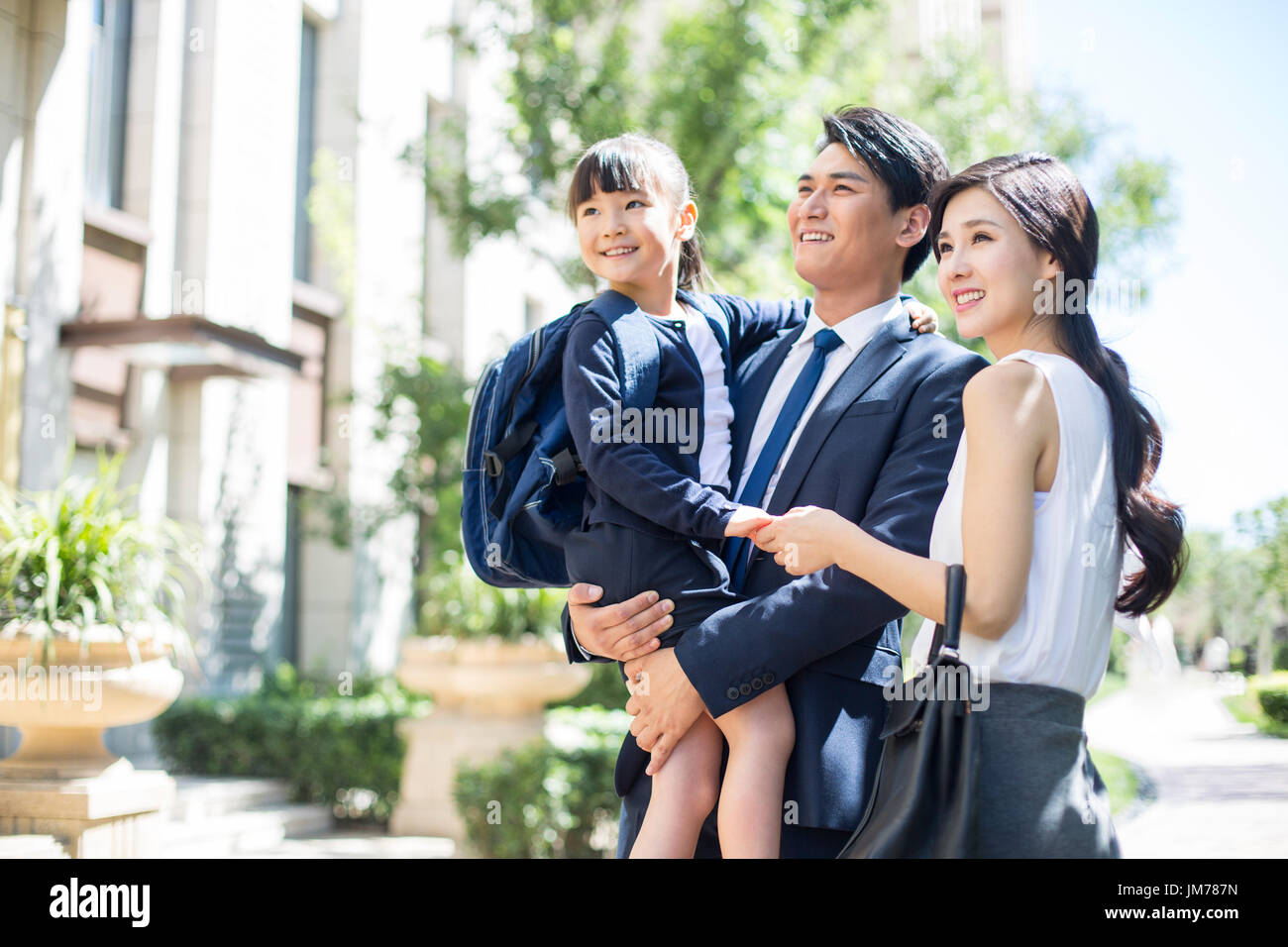 Parent child school uniform asian hi-res stock photography and images ...