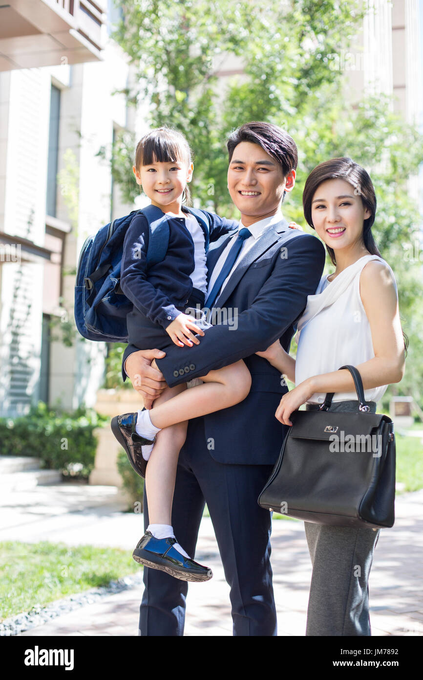 Chinese parents taking their child to school in the morning Stock Photo ...