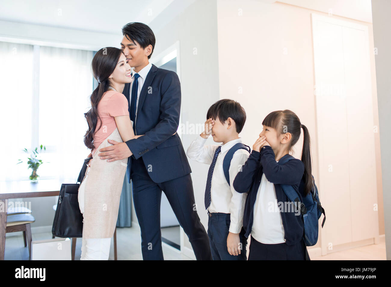 Happy young Chinese family Stock Photo - Alamy
