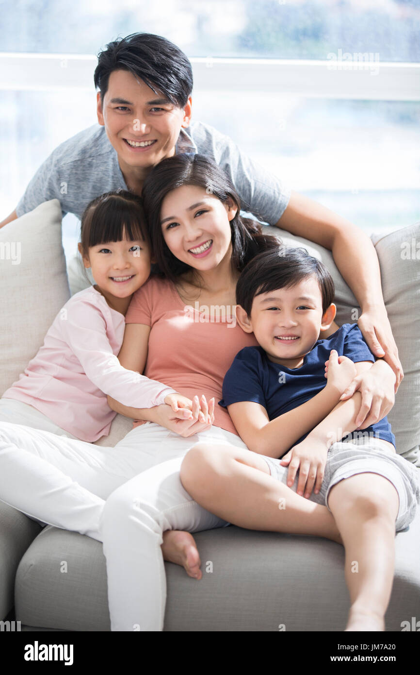 Happy young Chinese family Stock Photo - Alamy