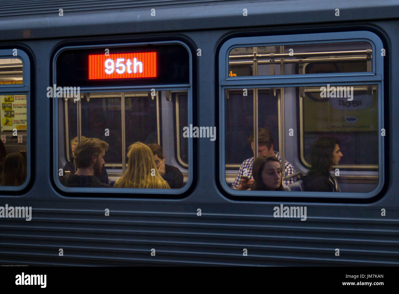 girl looking out a subway window Stock Photo - Alamy