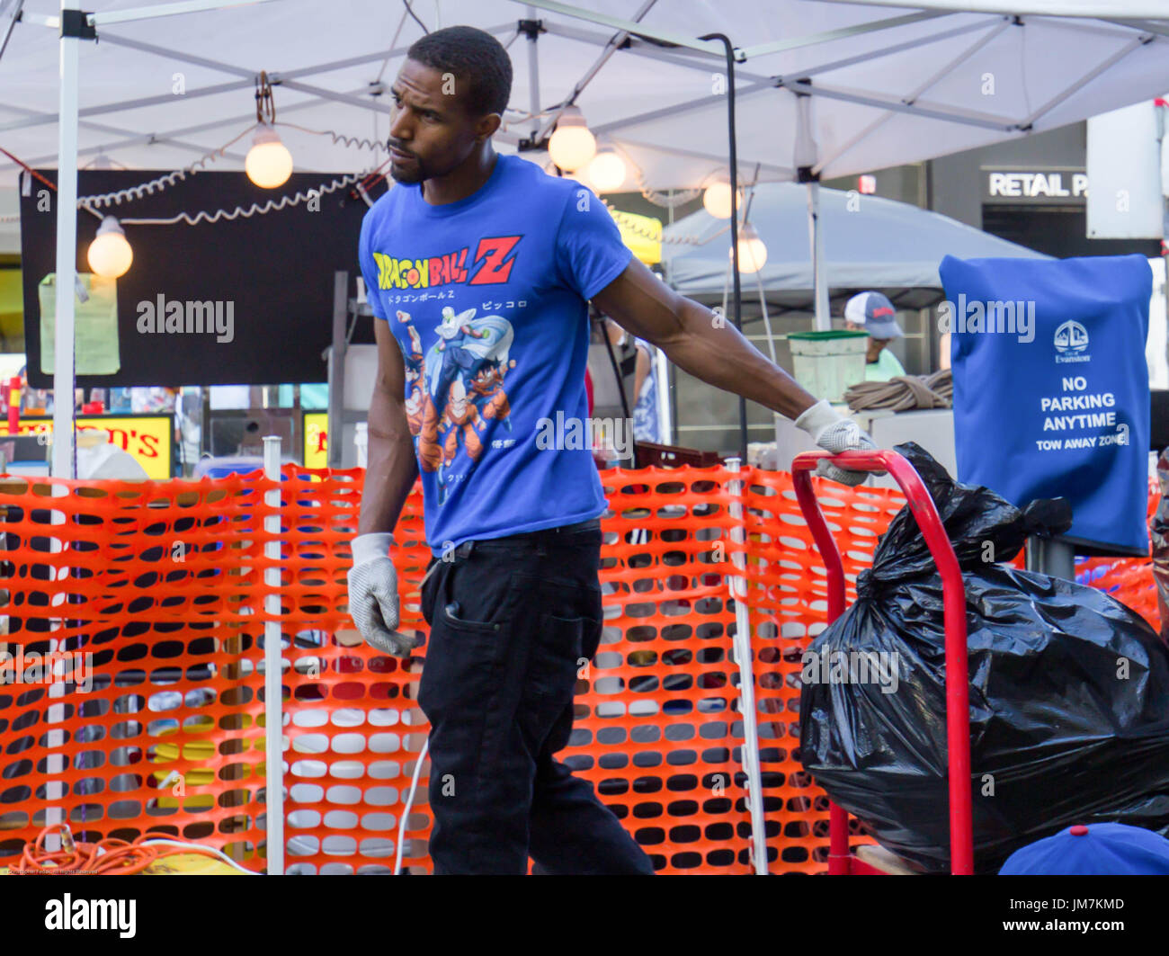 pulling trash cart Stock Photo - Alamy