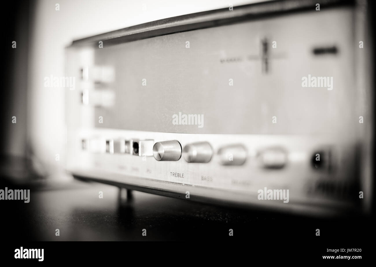 Vintage radio tuner home interior, black and white and selective focus ...